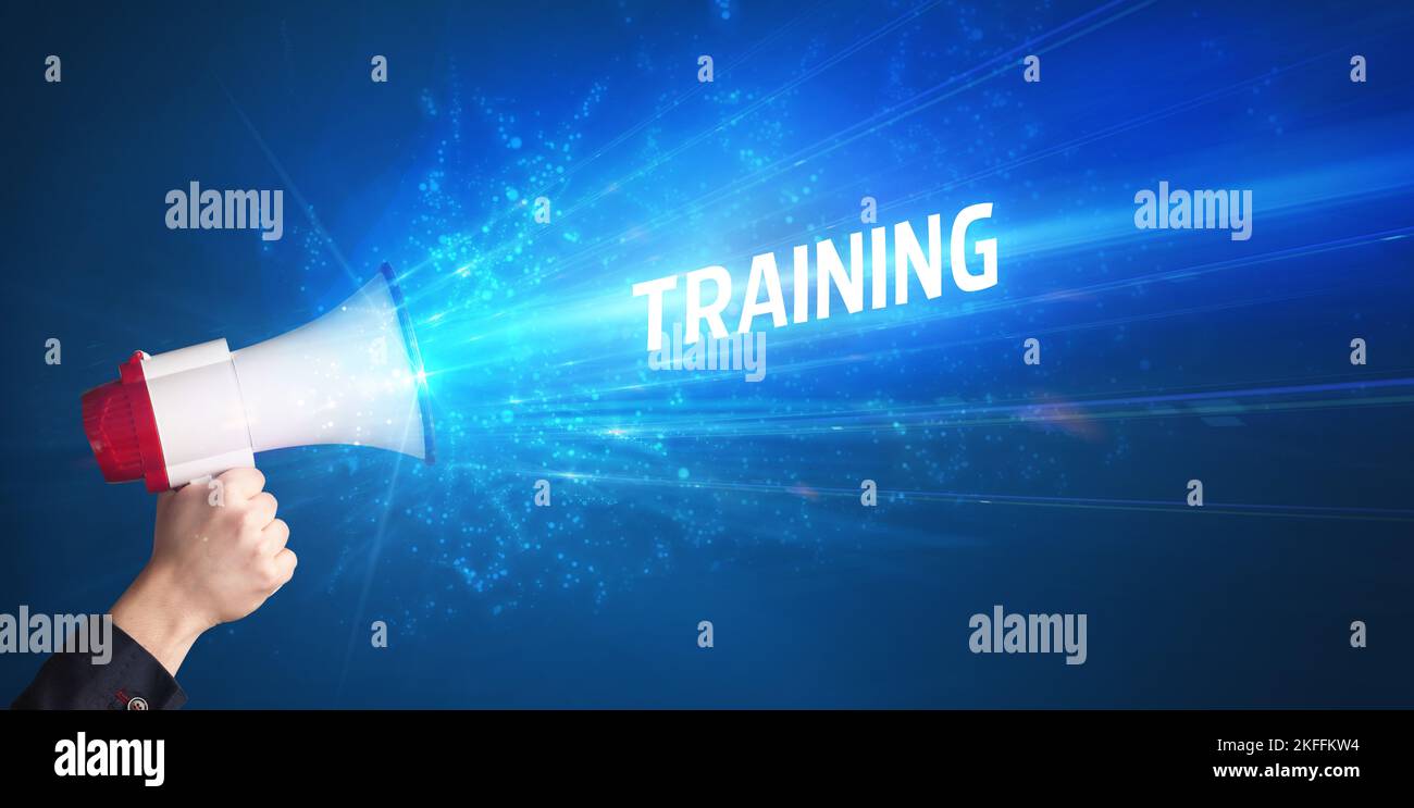 Young person shouting in loudspeaker Stock Photo - Alamy