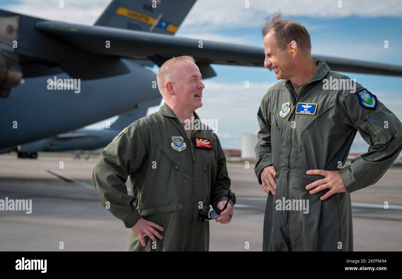 U.S. Air Force Maj. Gen. Corey Martin, 18th Air Force commander, right ...