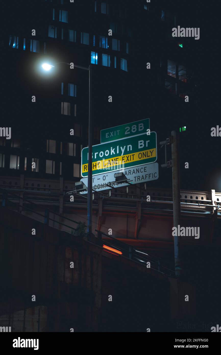 A street sign of Brooklyn Bridge for right lane exit only, New York ...