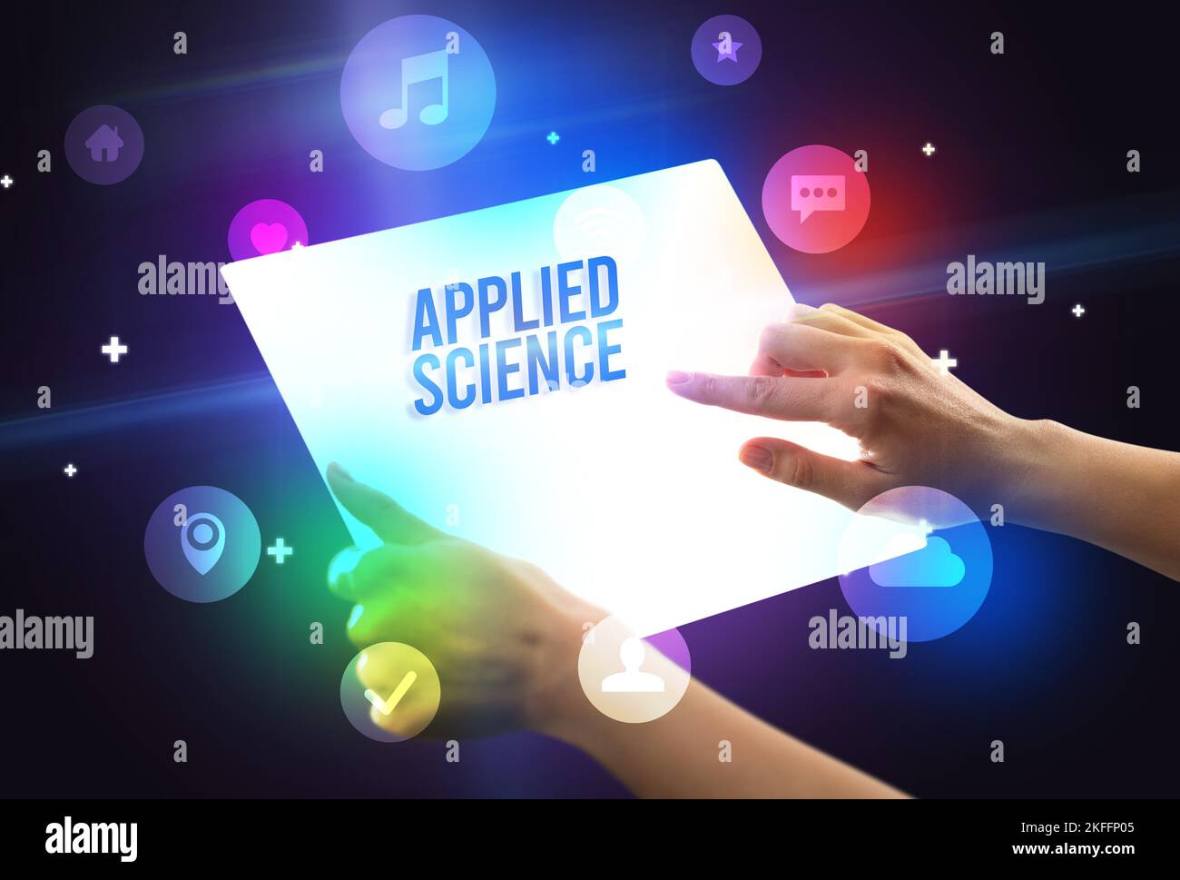 Holding futuristic tablet, new media concept Stock Photo - Alamy