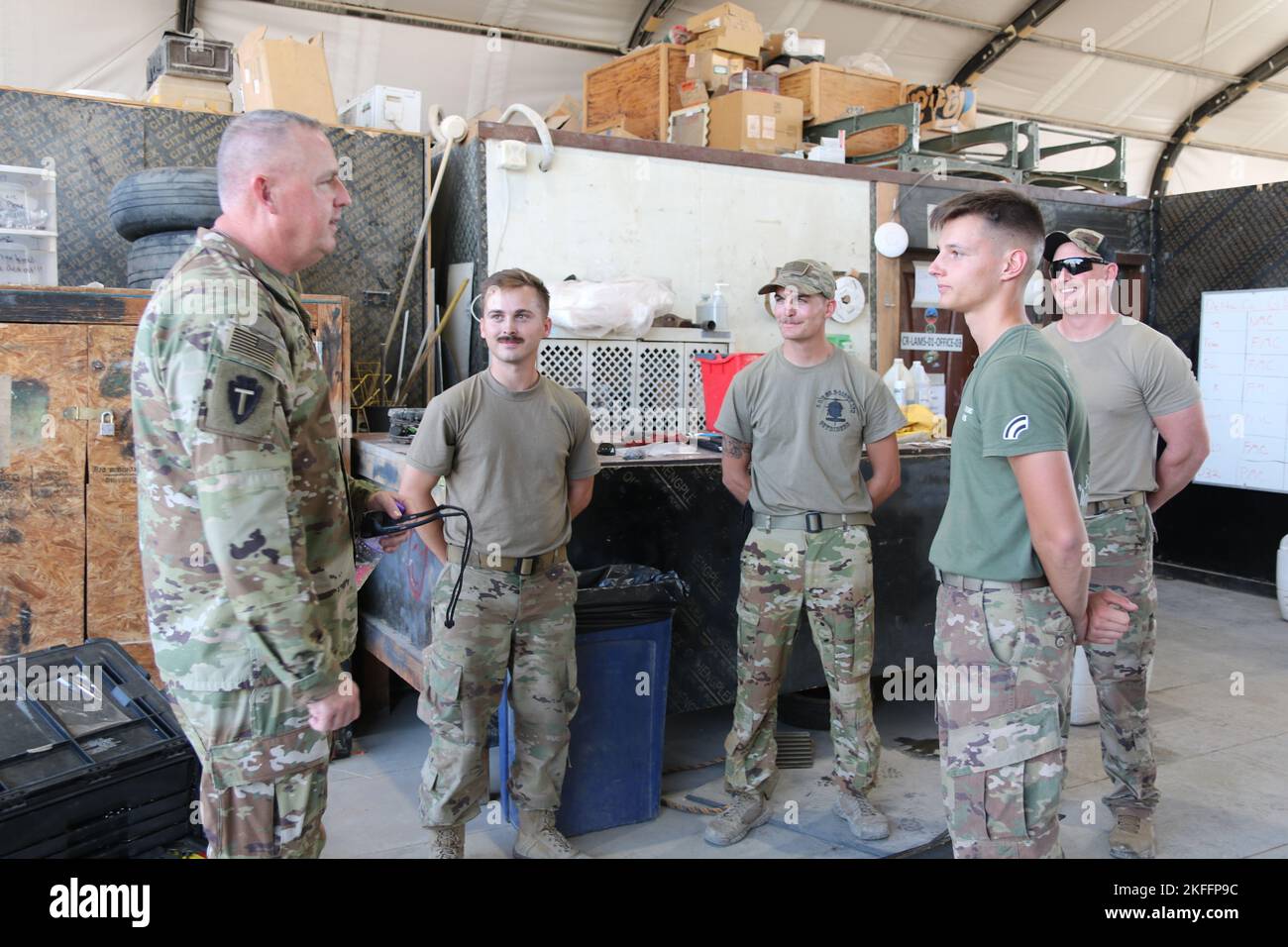 U.S. Army Command Sgt. Maj. Robert W. Hartzog (far left), command ...