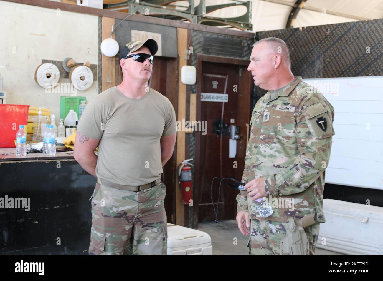 U.S. Army Command Sgt. Maj. Robert W. Hartzog (right) command sergeant ...