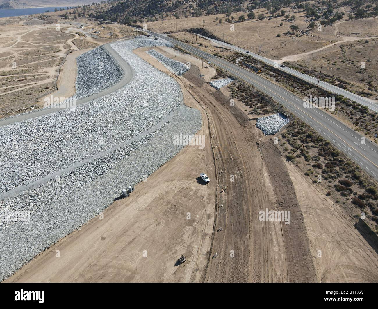 An aerial view of the left abutment or “dogleg” of the auxiliary dam at ...
