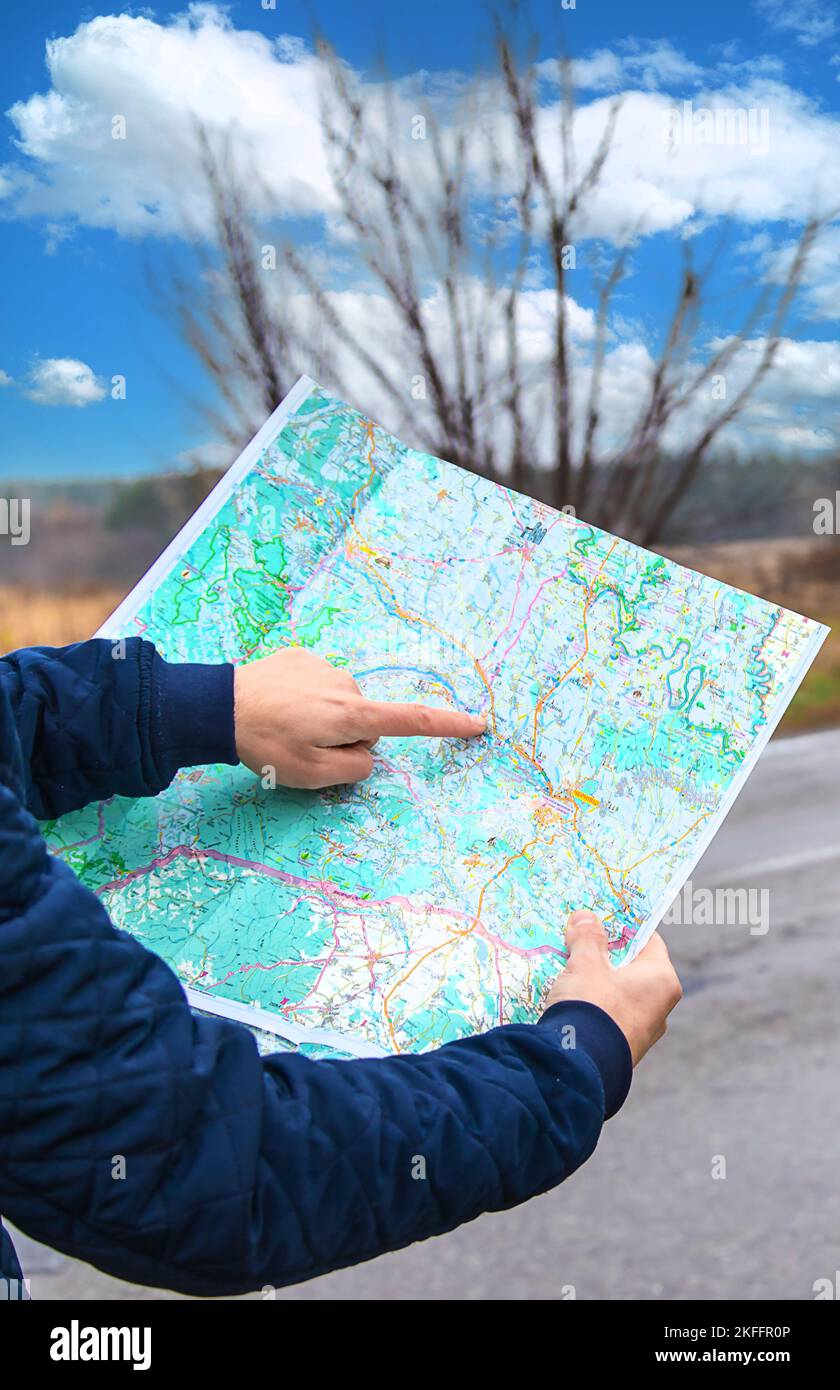 Young traveler on road trip reading map hi-res stock photography and ...