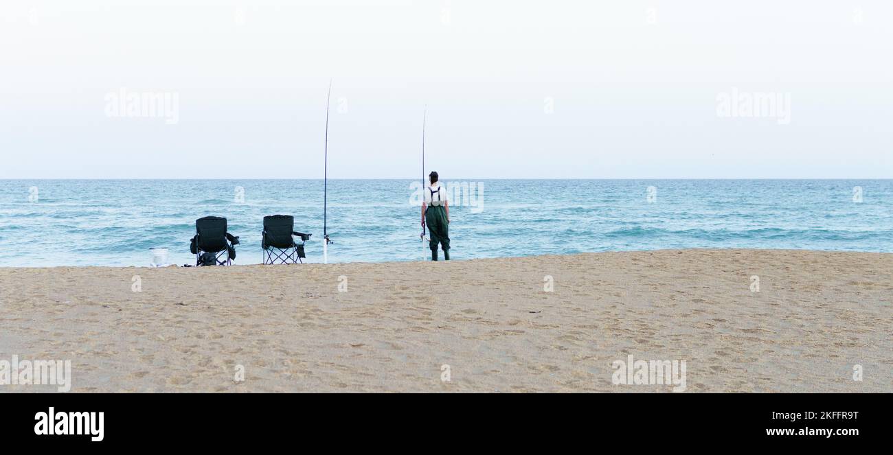 Solo shore fisherman hi-res stock photography and images - Alamy