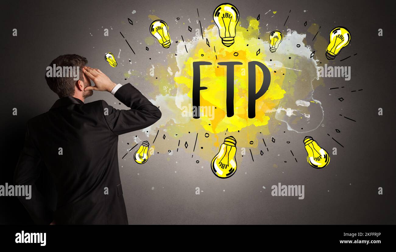 man drawing colorful light bulb Stock Photo - Alamy