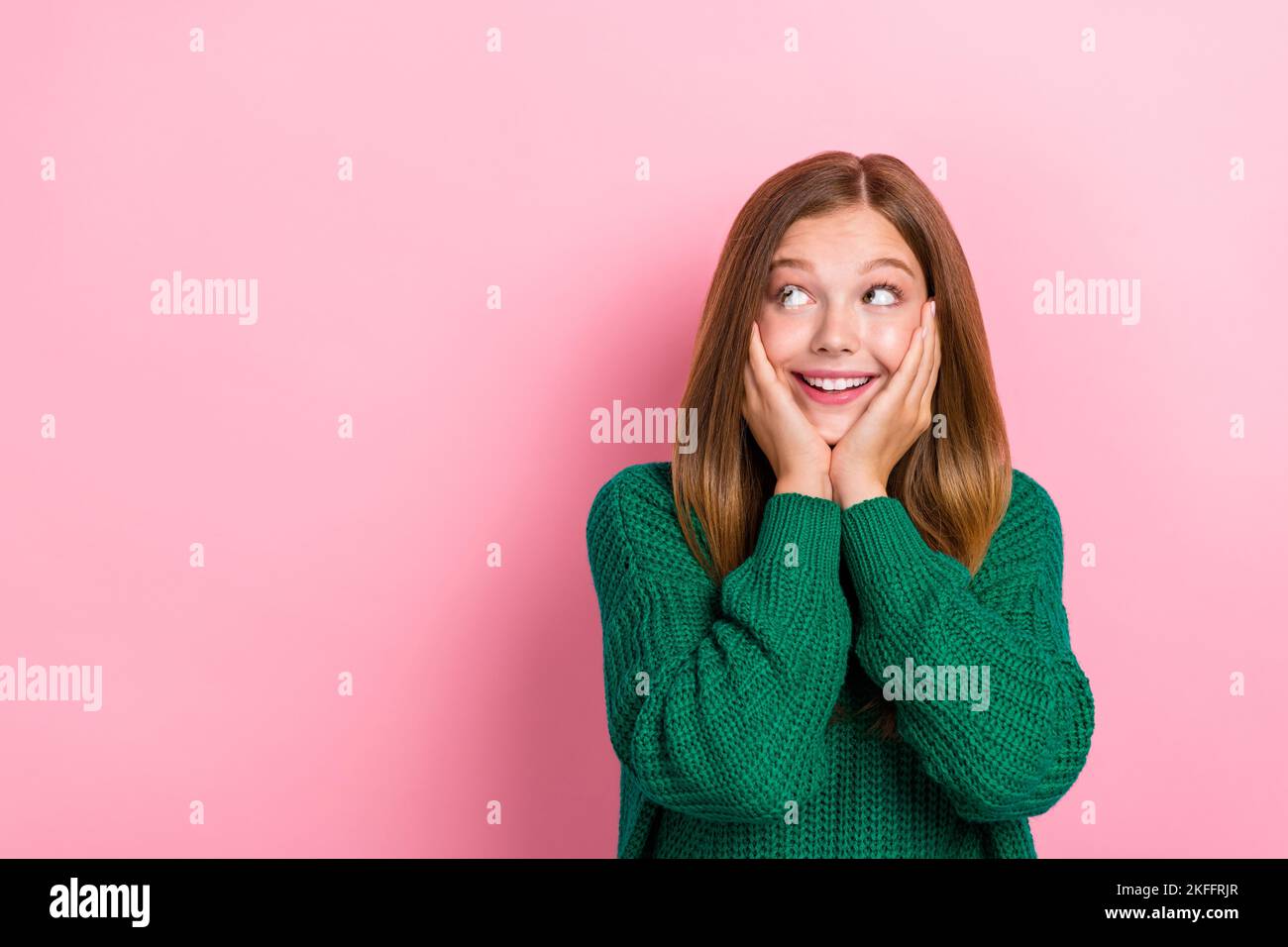 Photo of adorable funny girl dressed knitted pullover arms cheeks ...