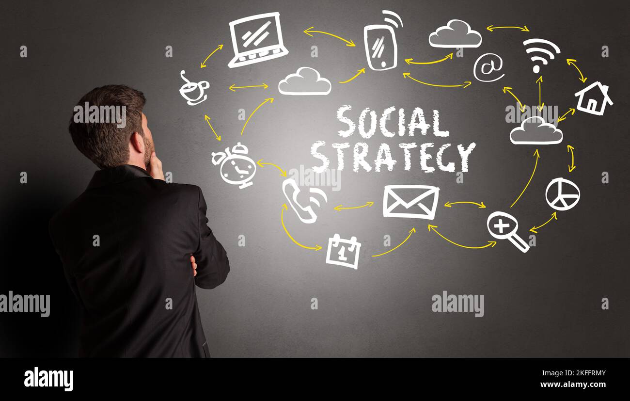 businessman drawing social media icons Stock Photo - Alamy