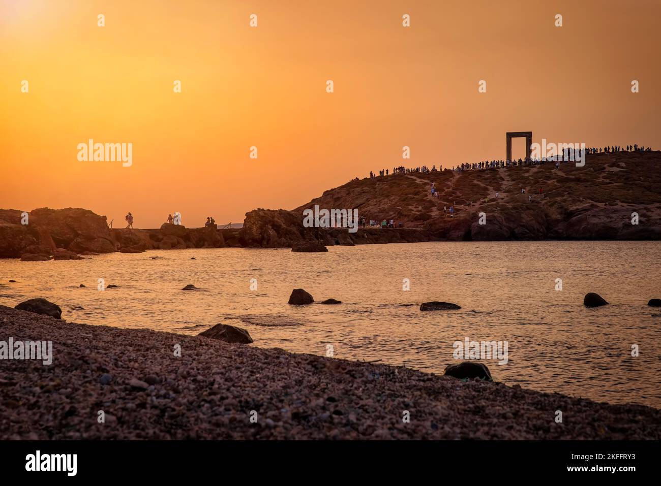 The bay in front of the famous Portara gate at Naxos island Stock Photo ...