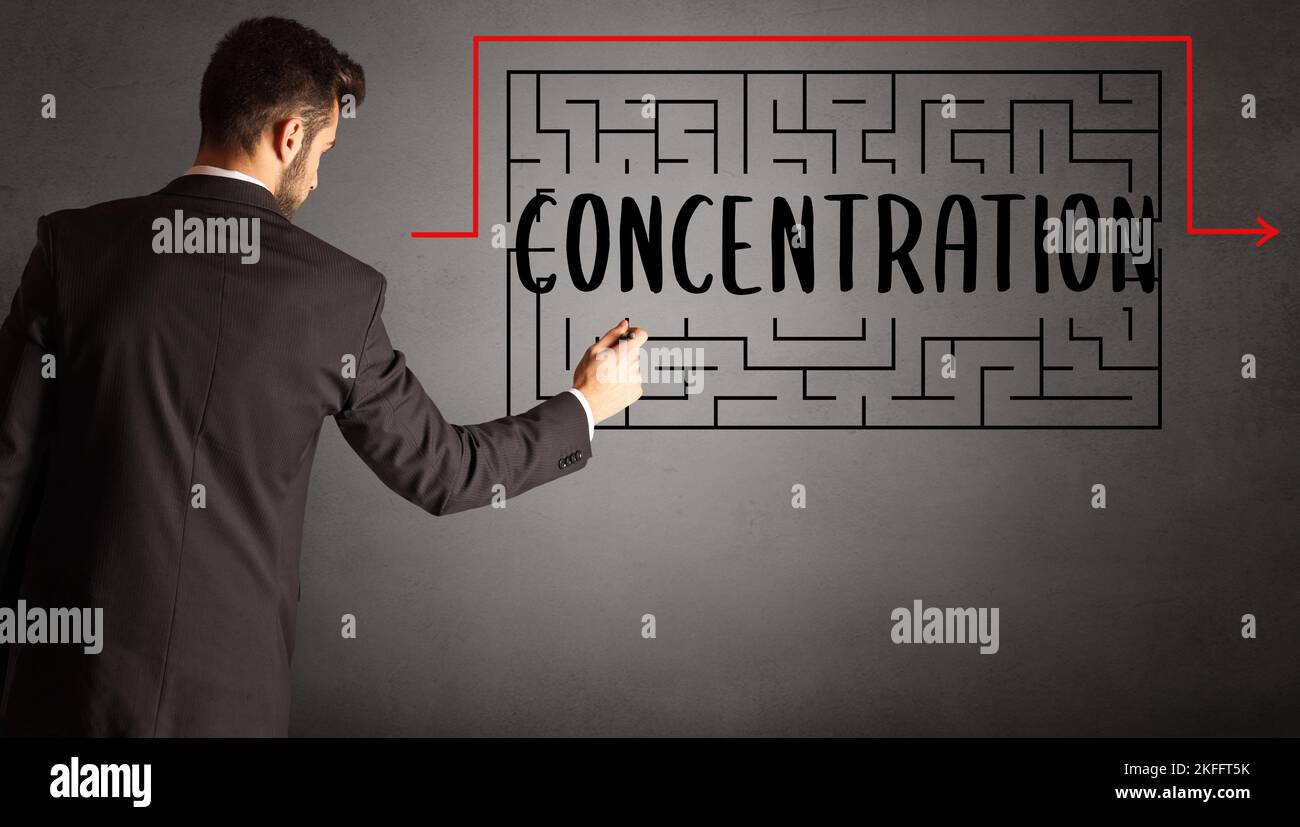 businessman drawing maze concept Stock Photo - Alamy