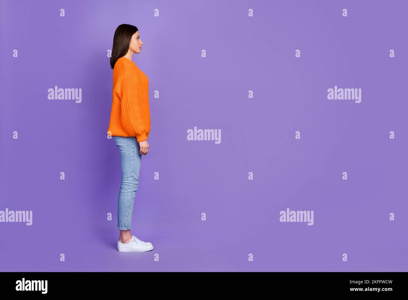 Full size profile photo of focused lady standing look empty space ...