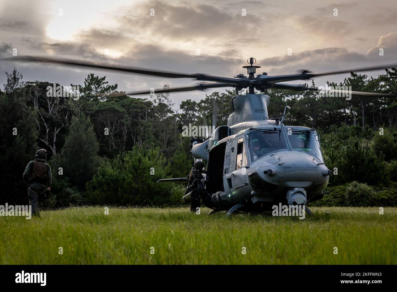U.S. Marine Corps UH-1Y Venom helicopter crew chiefs with Marine Light ...