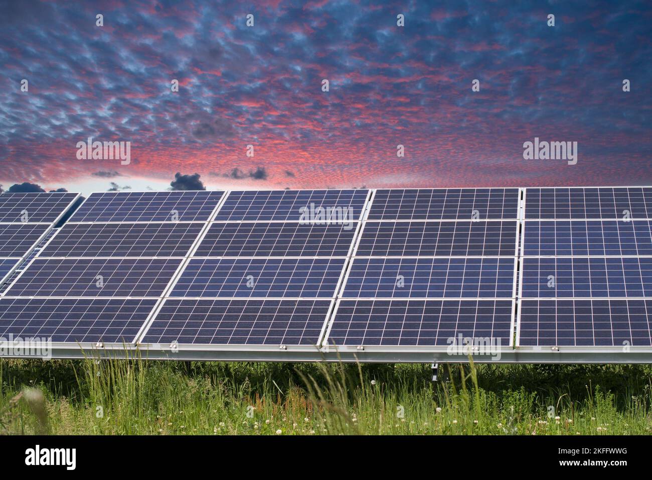 Solar panels and sunset. Solar panels system power generators from sun ...