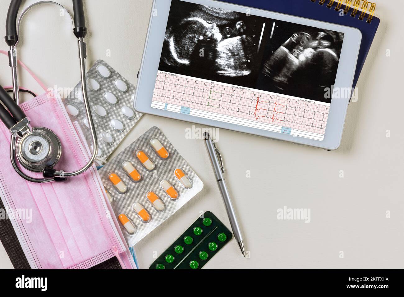 During pregnancy doctor checks ultrasound of pregnant woman to ...