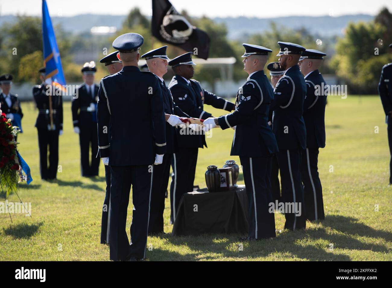 Members of the United States Air Force Honor Guard perform an interment ...