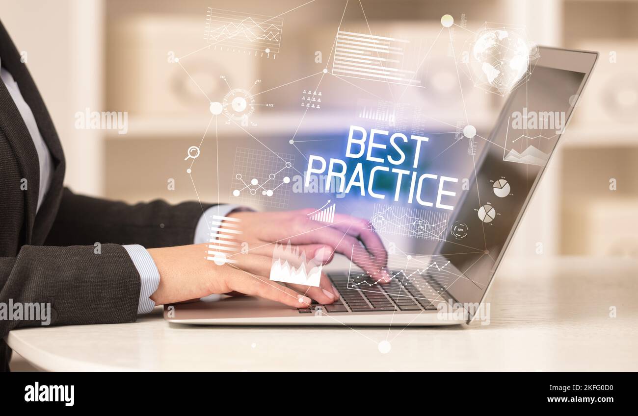 Side view of a business person working on laptop Stock Photo - Alamy