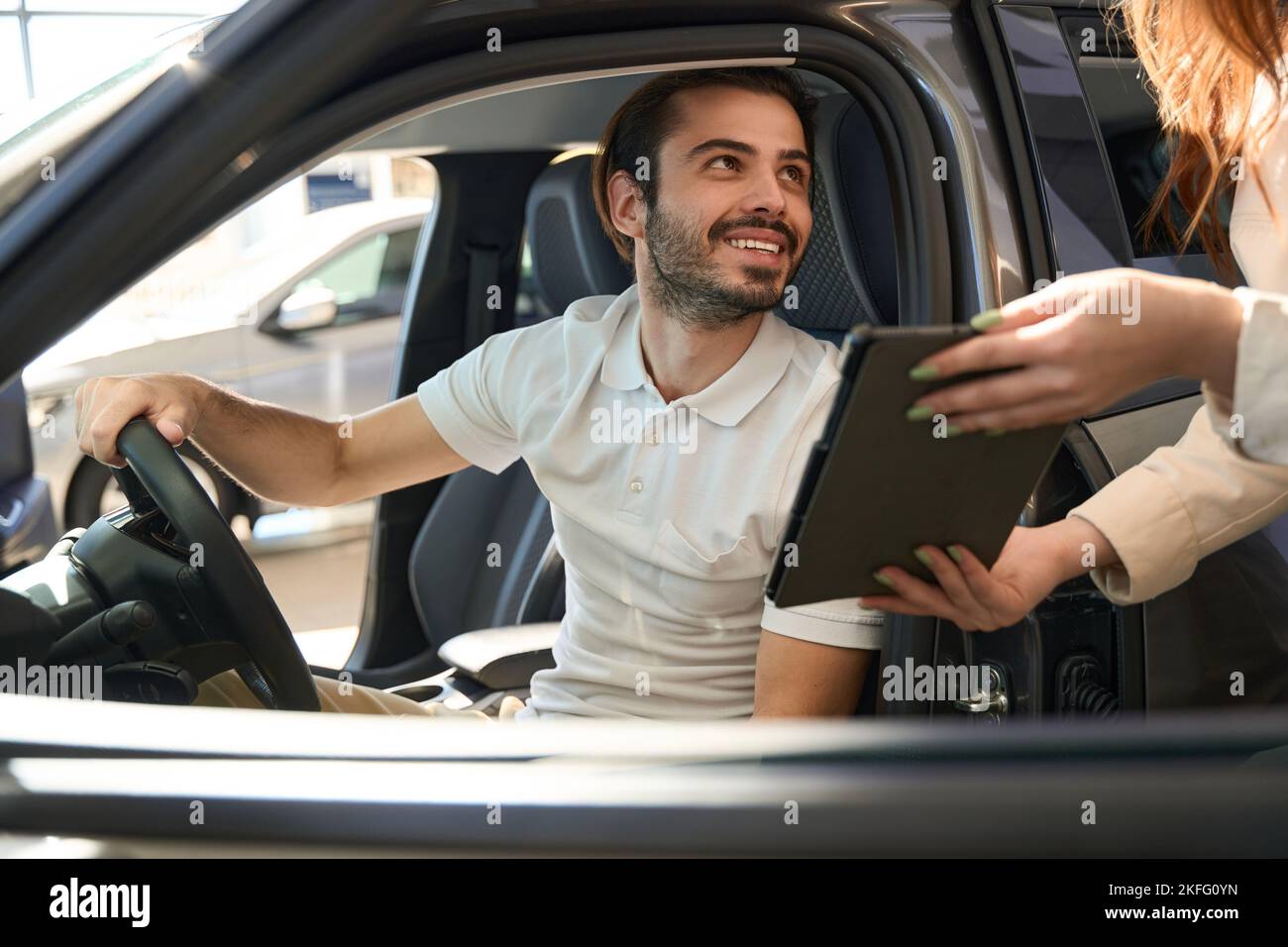 Car salesperson talking customer hi-res stock photography and images ...
