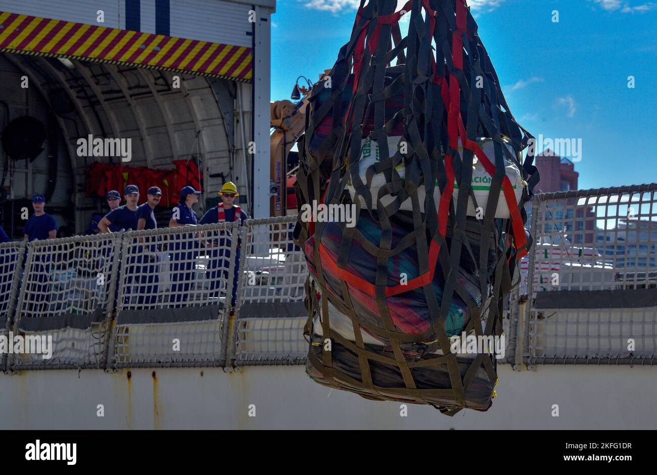 Bales of illegal drugs, worth an estimated $475 million, are offloaded ...