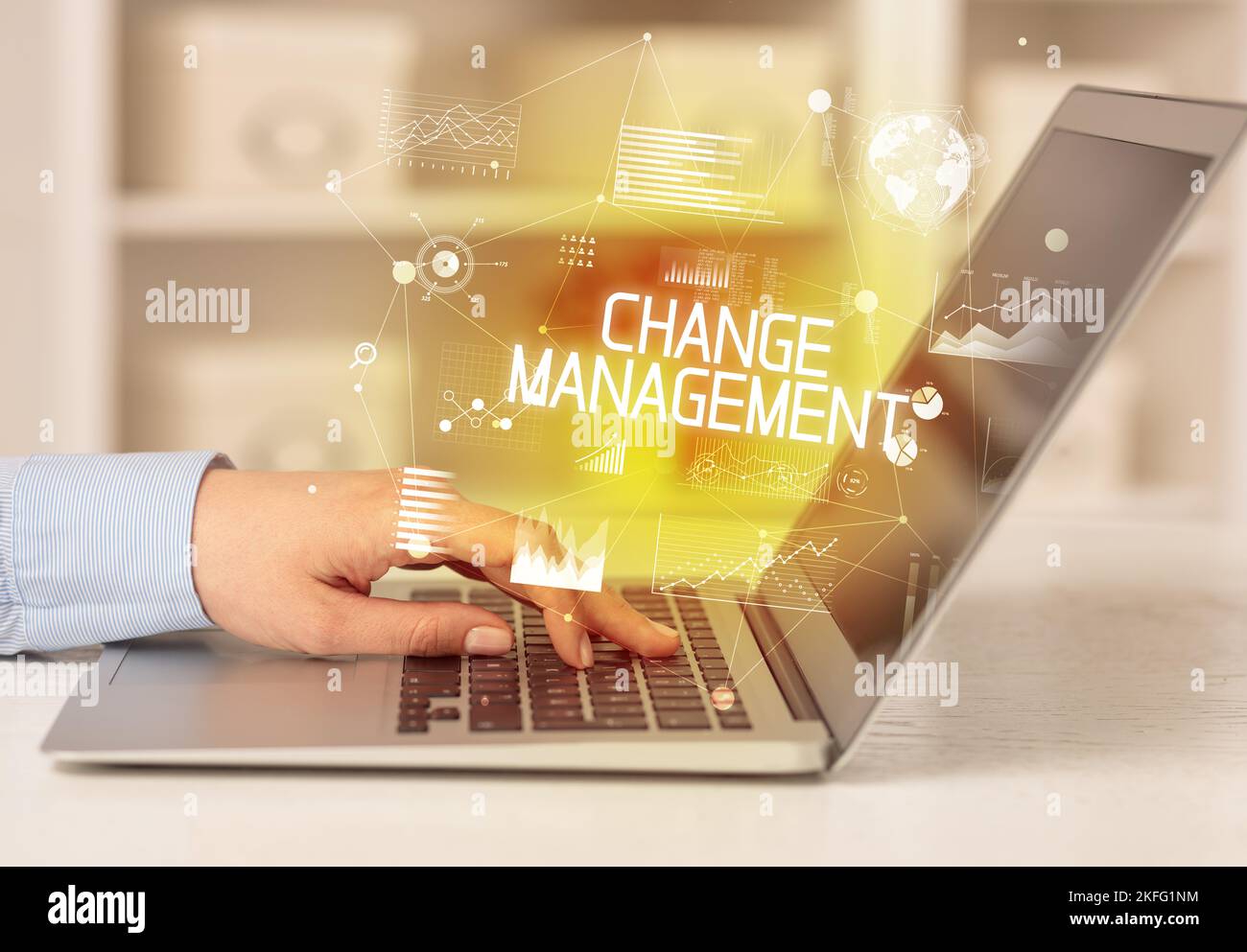 Side view of a business person working on laptop Stock Photo - Alamy