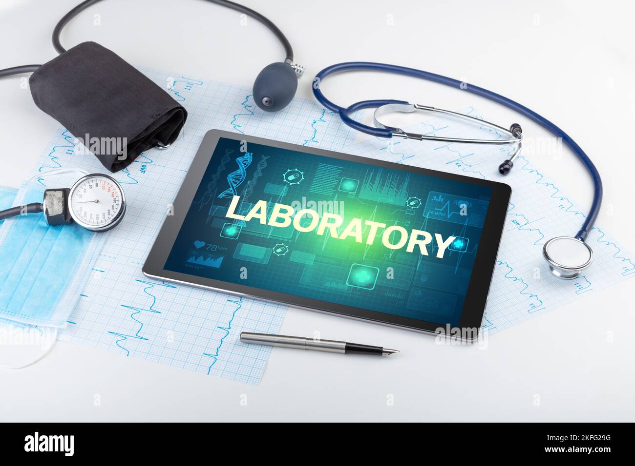 Tablet pc and medical stuff Stock Photo - Alamy