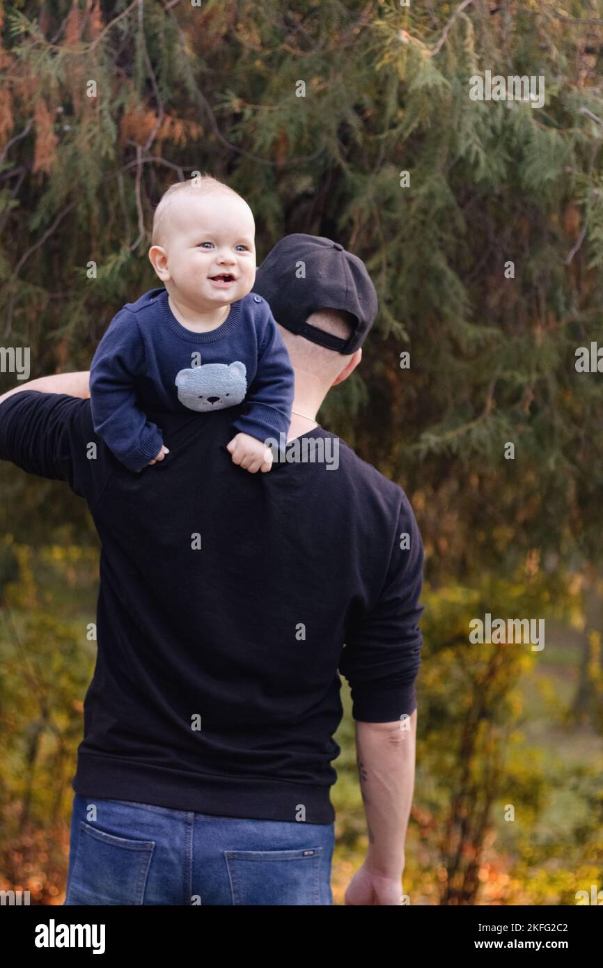 Happy father with his child outdoors Stock Photo - Alamy