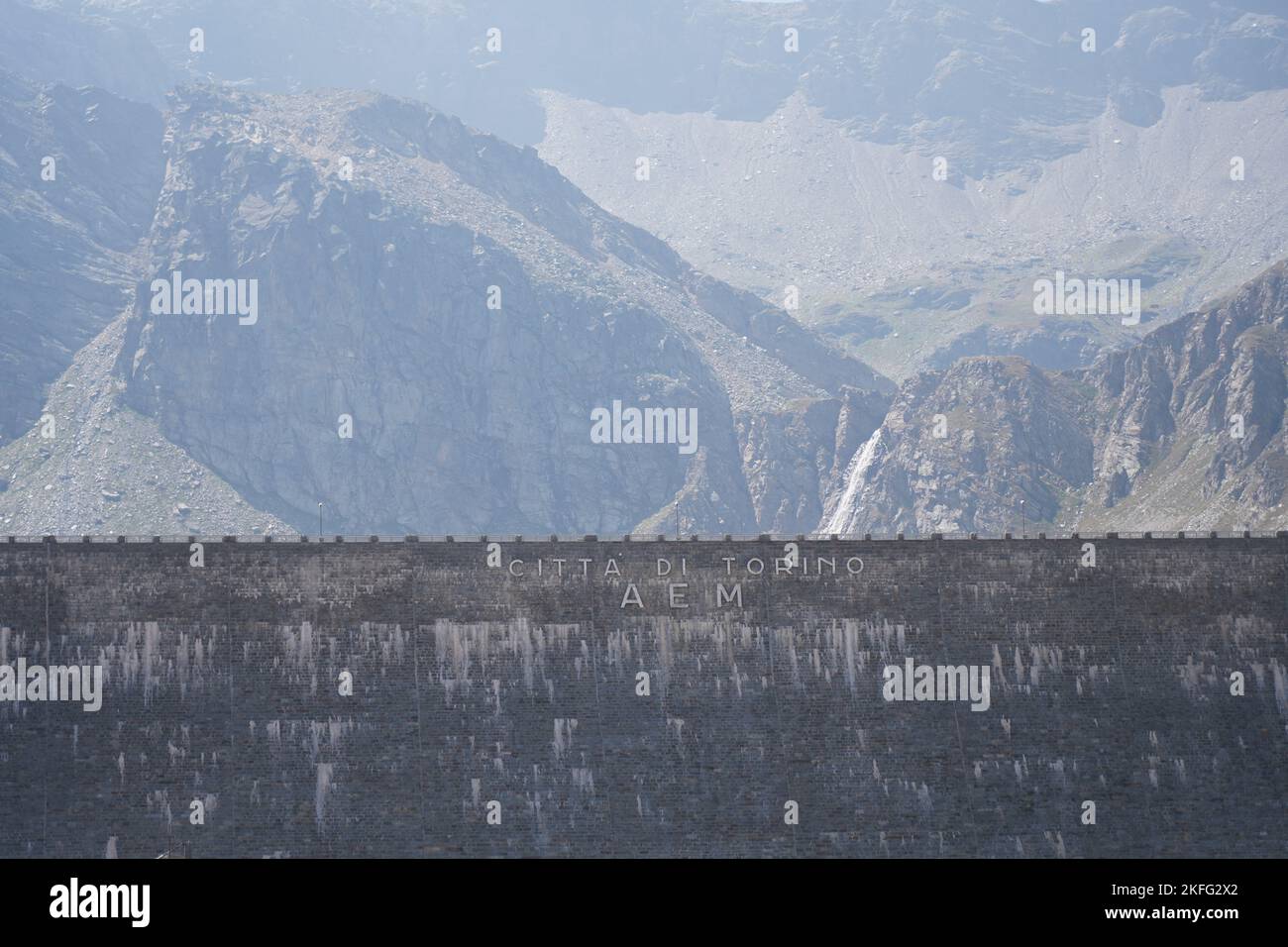 The lettering on the wall of Serru Lake dam: Citta di Torino AEM. Gran ...