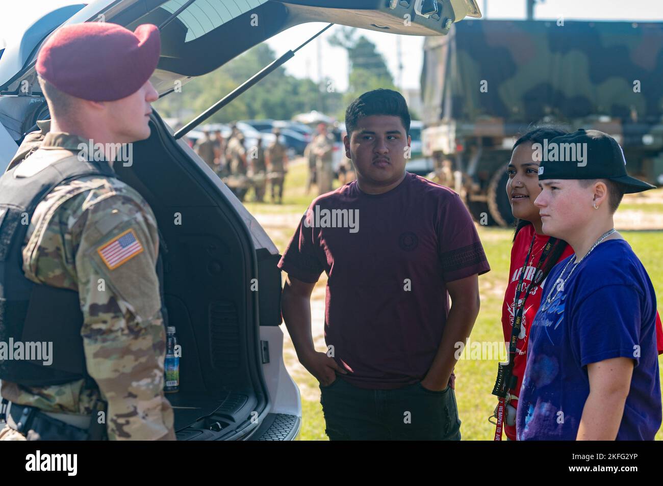 A military police Soldier with 16th MP Brigade speaks with school ...