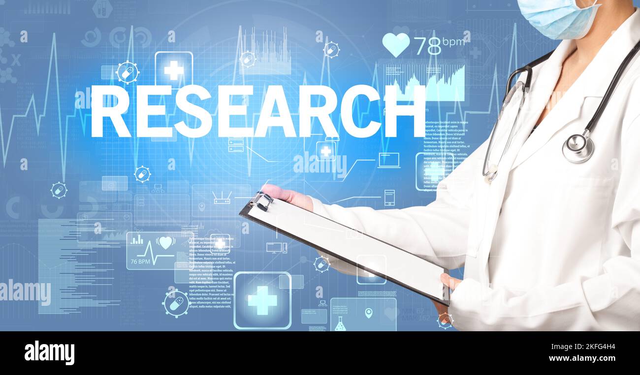 young doctor writing down notes Stock Photo - Alamy