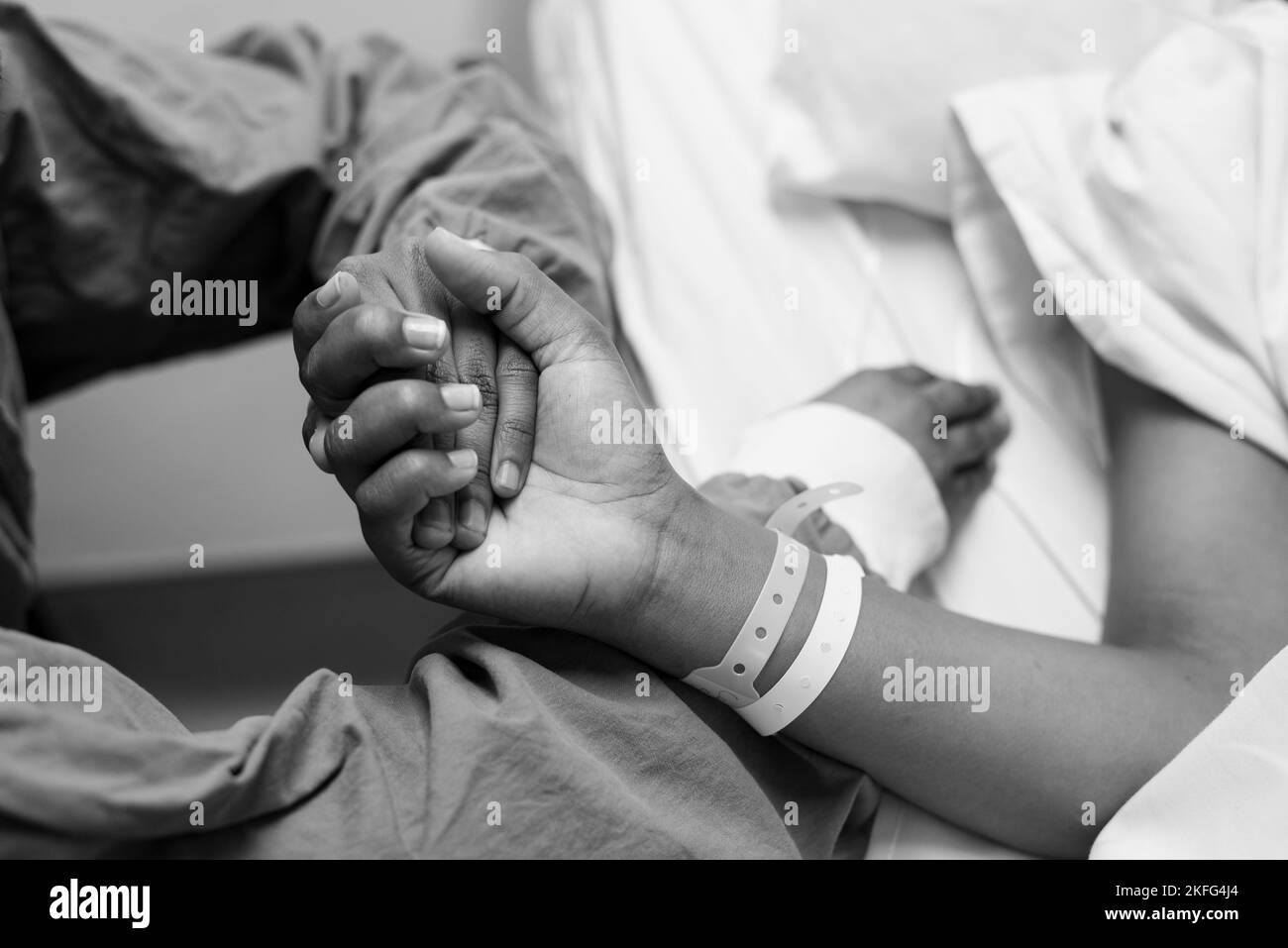 Hospital visit and hand holding hands hi-res stock photography and ...