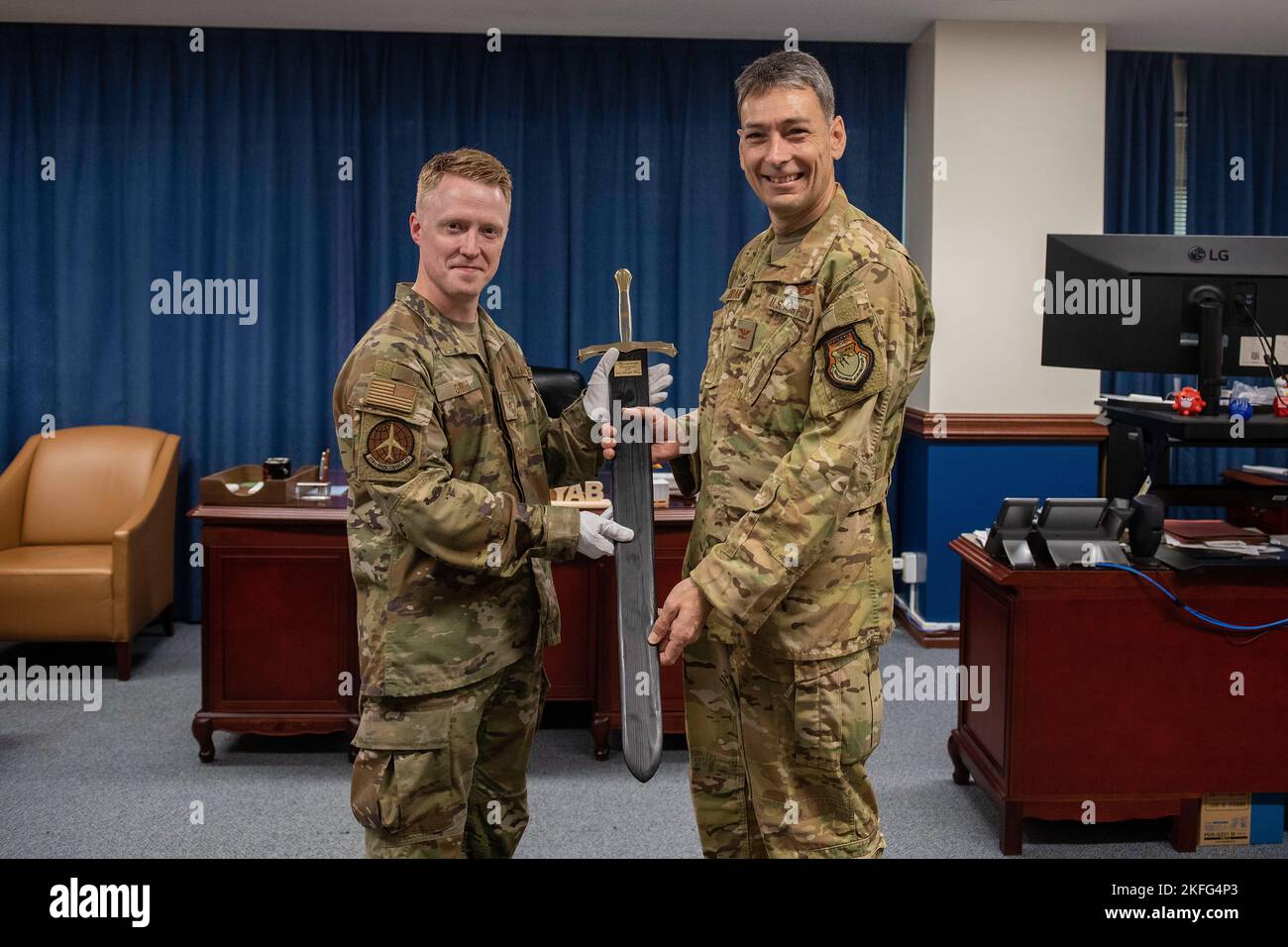 Col. Andrew Roddan, 374th Airlift Wing Commander, and Staff Sgt ...