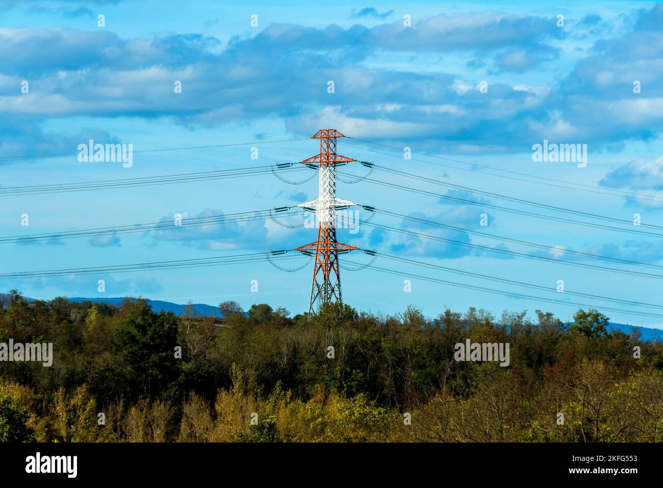 High voltage tower sky trees hi-res stock photography and images - Alamy