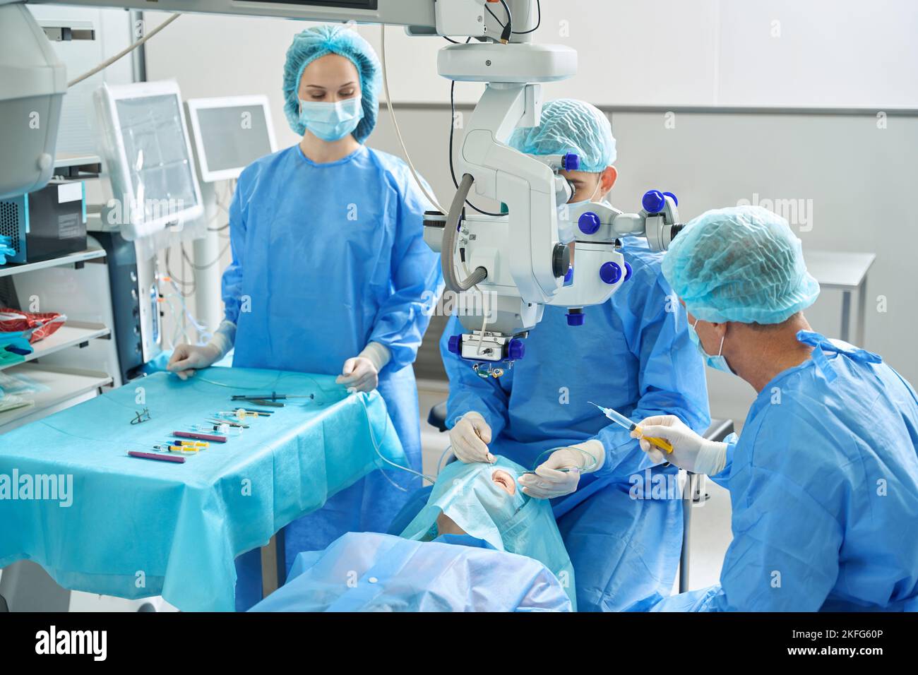 Two surgeons doing surgical procedure hi-res stock photography and ...