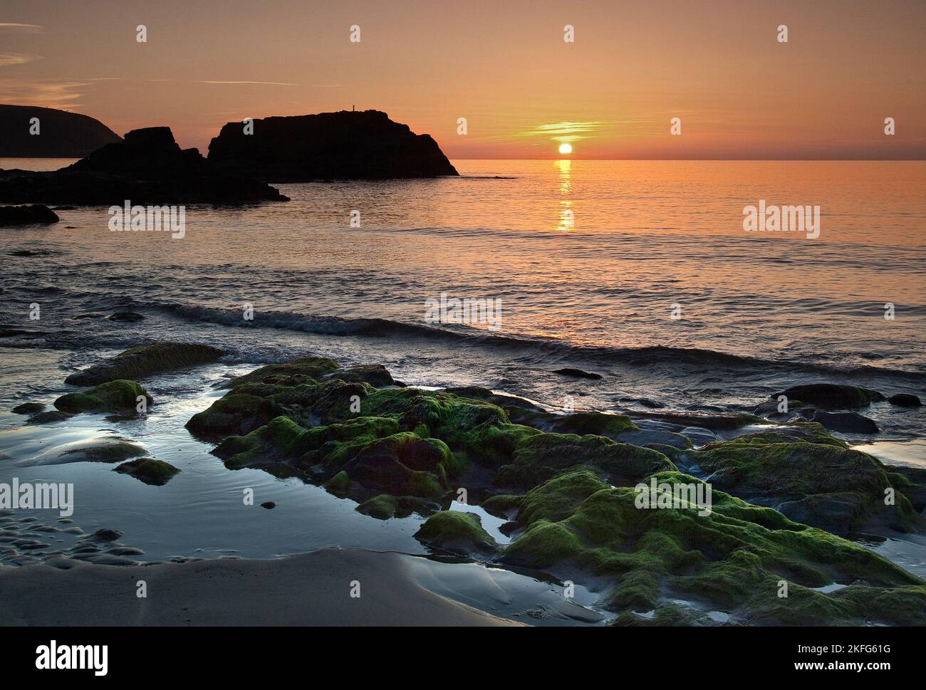 Photograph of summer sunset on the Irish Sea at Tresaith Cardigan Bay ...