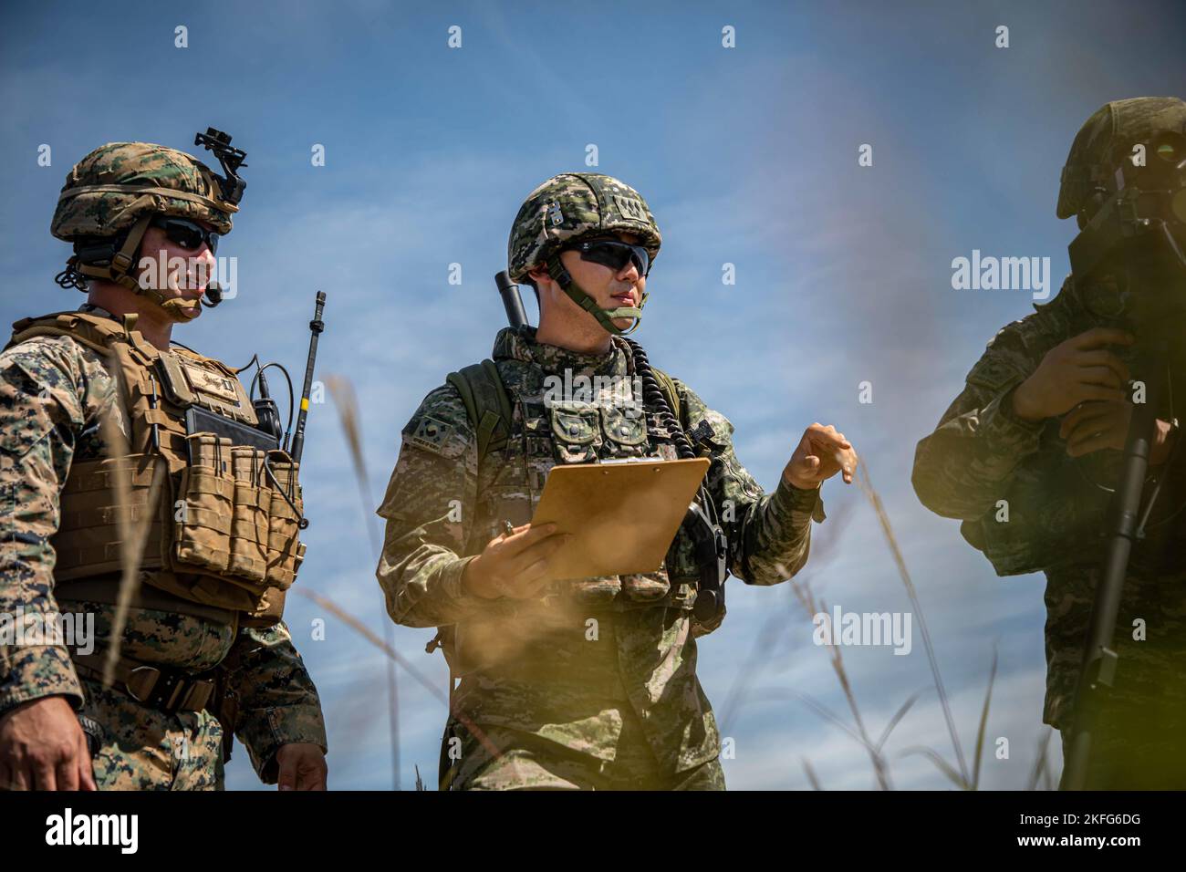 U.S. Marine Corps Capt. Shane Arena, a fire support coordinator (left ...