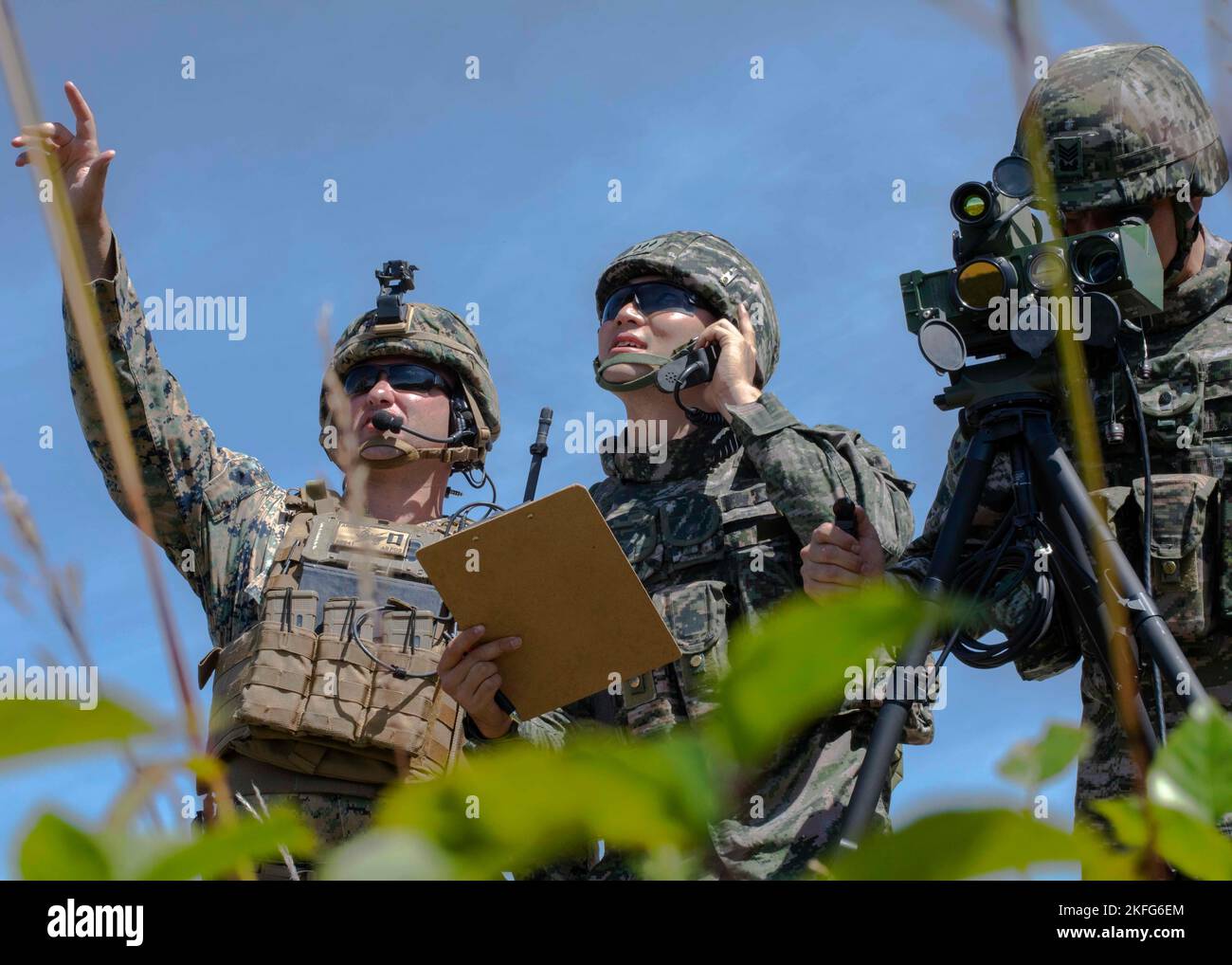 U.S. Marine Corps Capt. Shane Arena, a fire support coordinator (left ...