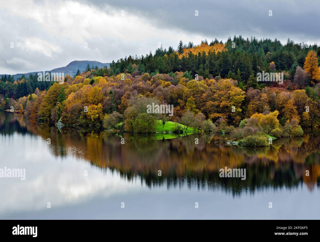 Photograph of Llyn Elsi in autumn and surrounding forest in Snowdonia ...