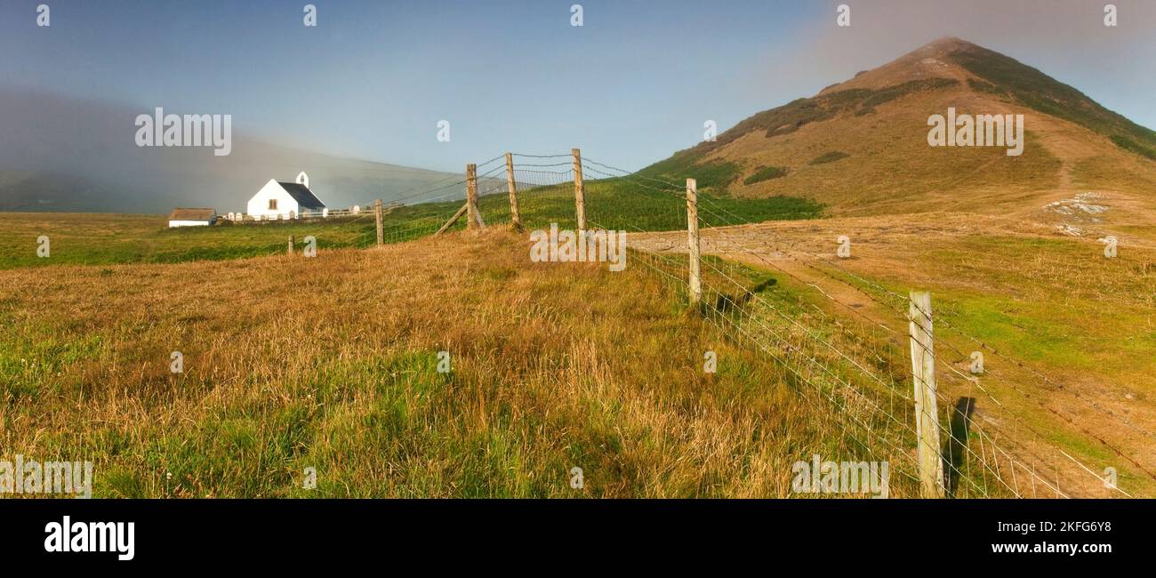 View of Medieval Mwnt Church of the Holy Cross (National Trust) below ...