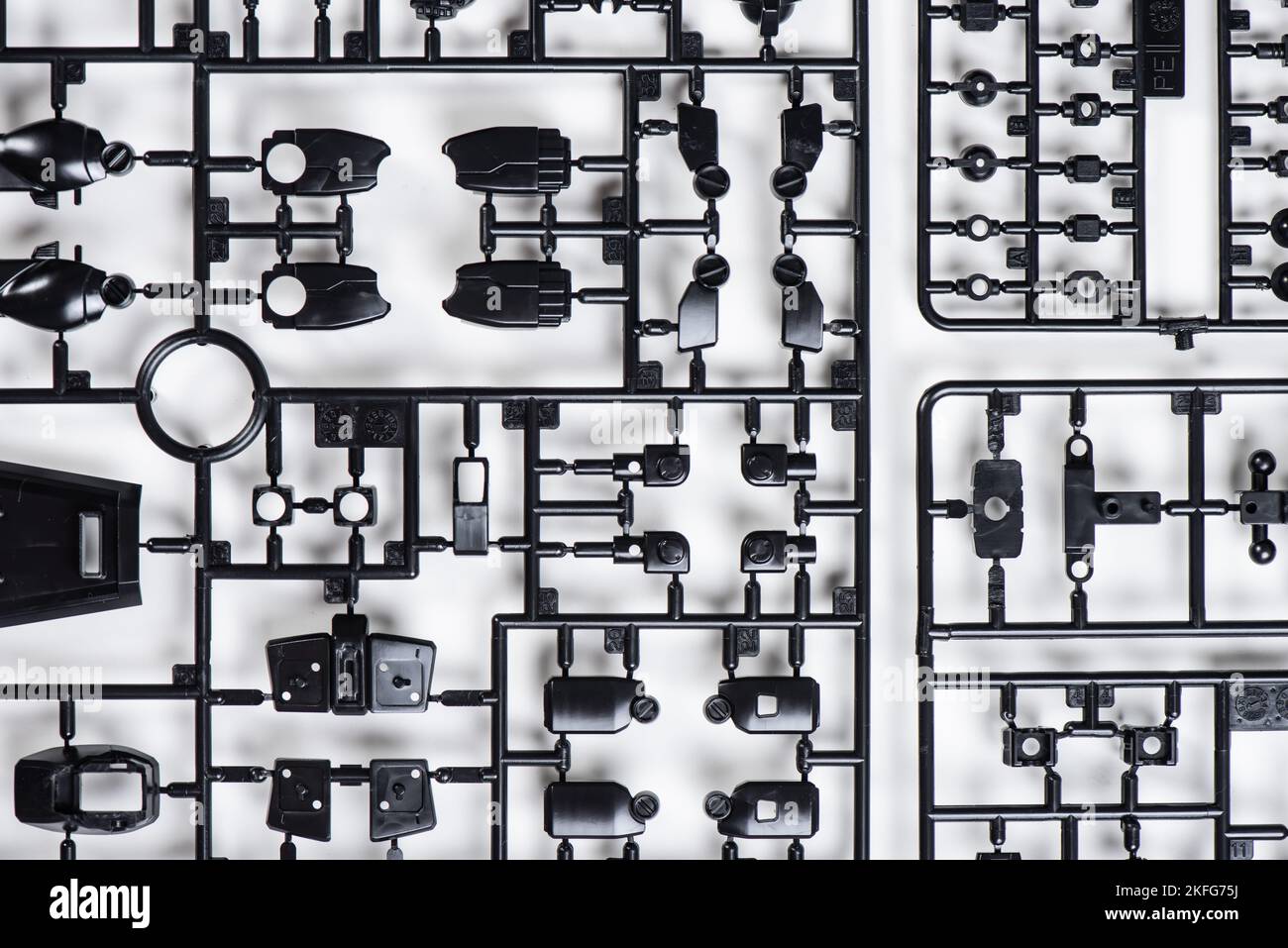 Black plastic sprues or injection moulding of model kit Stock Photo - Alamy