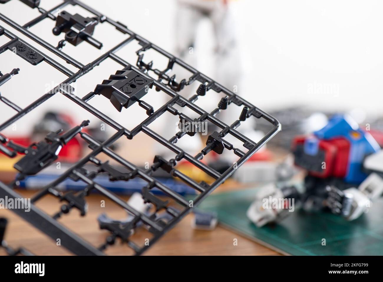 Close up black plastic sprues or injection moulding of model kit ...