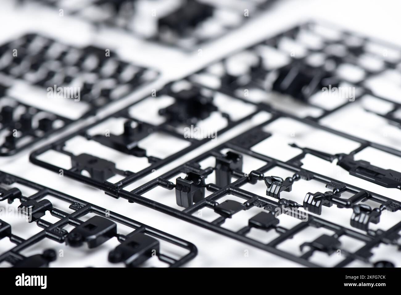 Black plastic sprues or injection moulding of model kit Stock Photo - Alamy