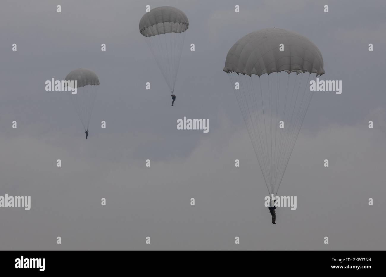 A group of U.S. Army and European Paratroopers conduct an Airborne jump ...