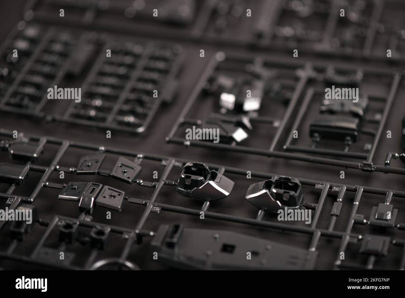 Black plastic sprues or injection moulding of model kit Stock Photo - Alamy
