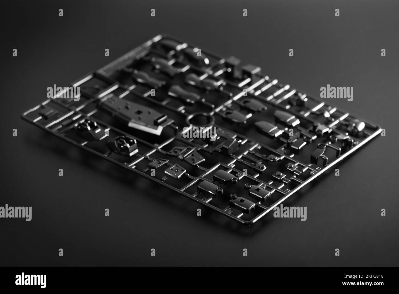 Black plastic sprues or injection moulding of model kit Stock Photo - Alamy