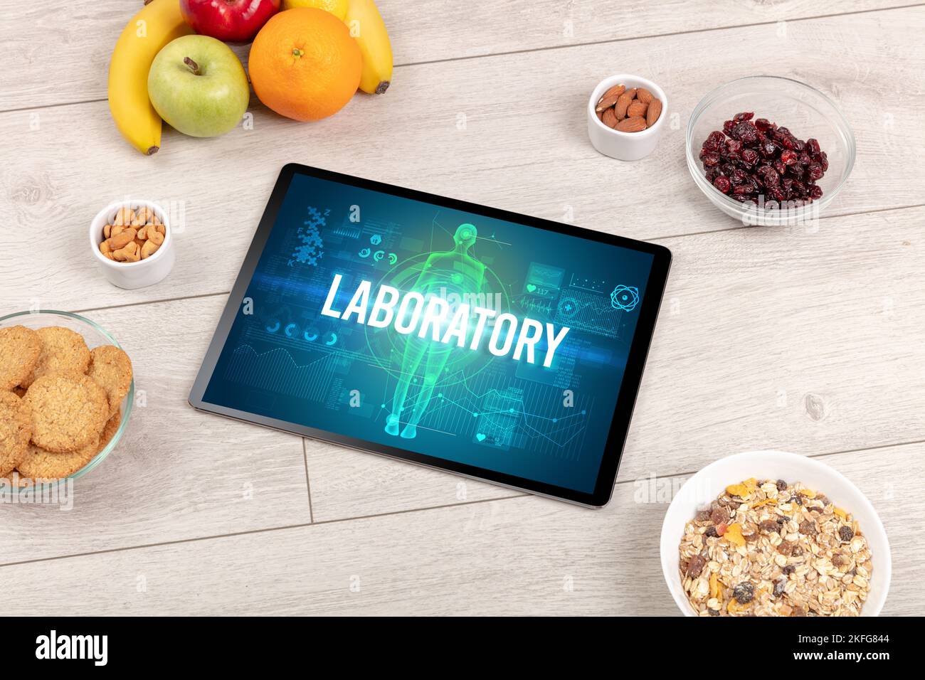 Tablet Pc with fruits, medical concept Stock Photo - Alamy