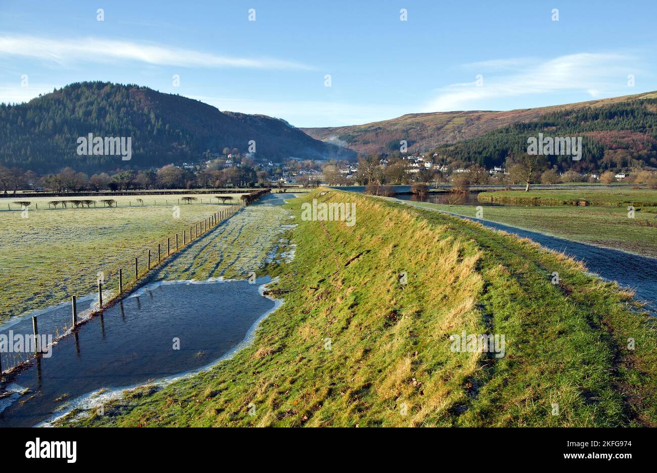 Flood barrier near Trefriw in the Conwy Valley on a frosty winters day ...