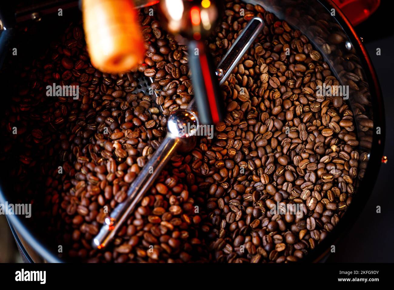 Coffee beans in a coffee machine, in dark colors Stock Photo - Alamy