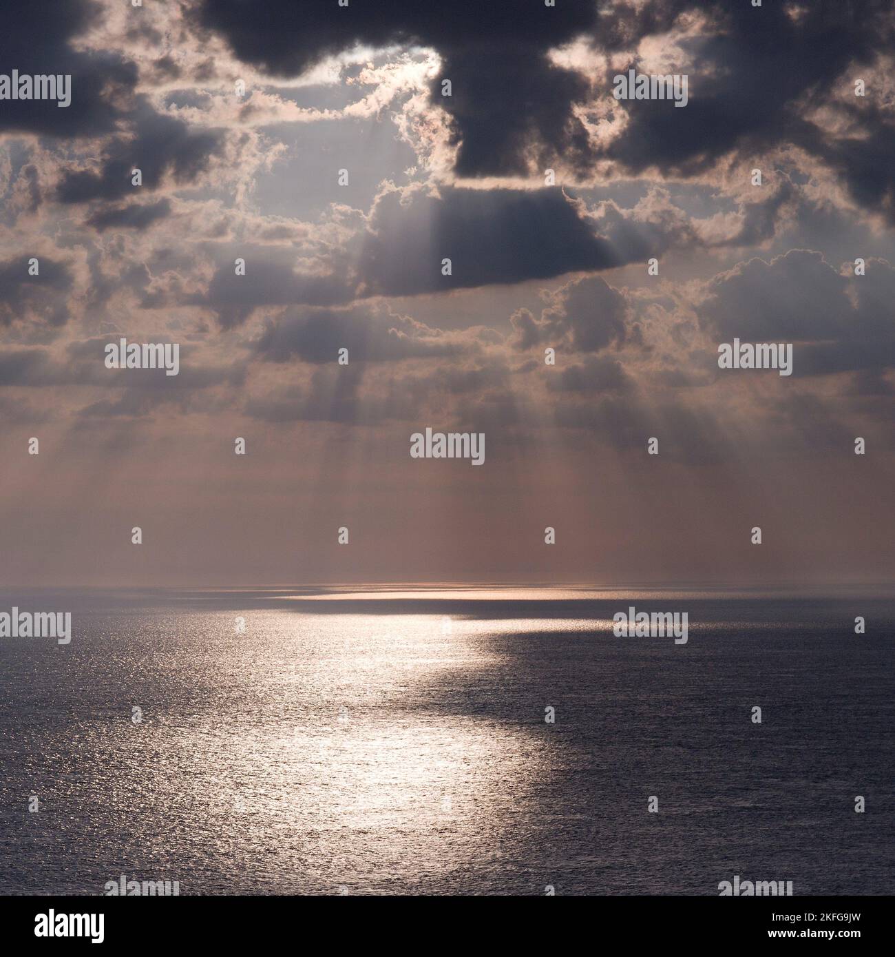Sunrays illuminate the Irish Sea on the western coast of Holy Island ...