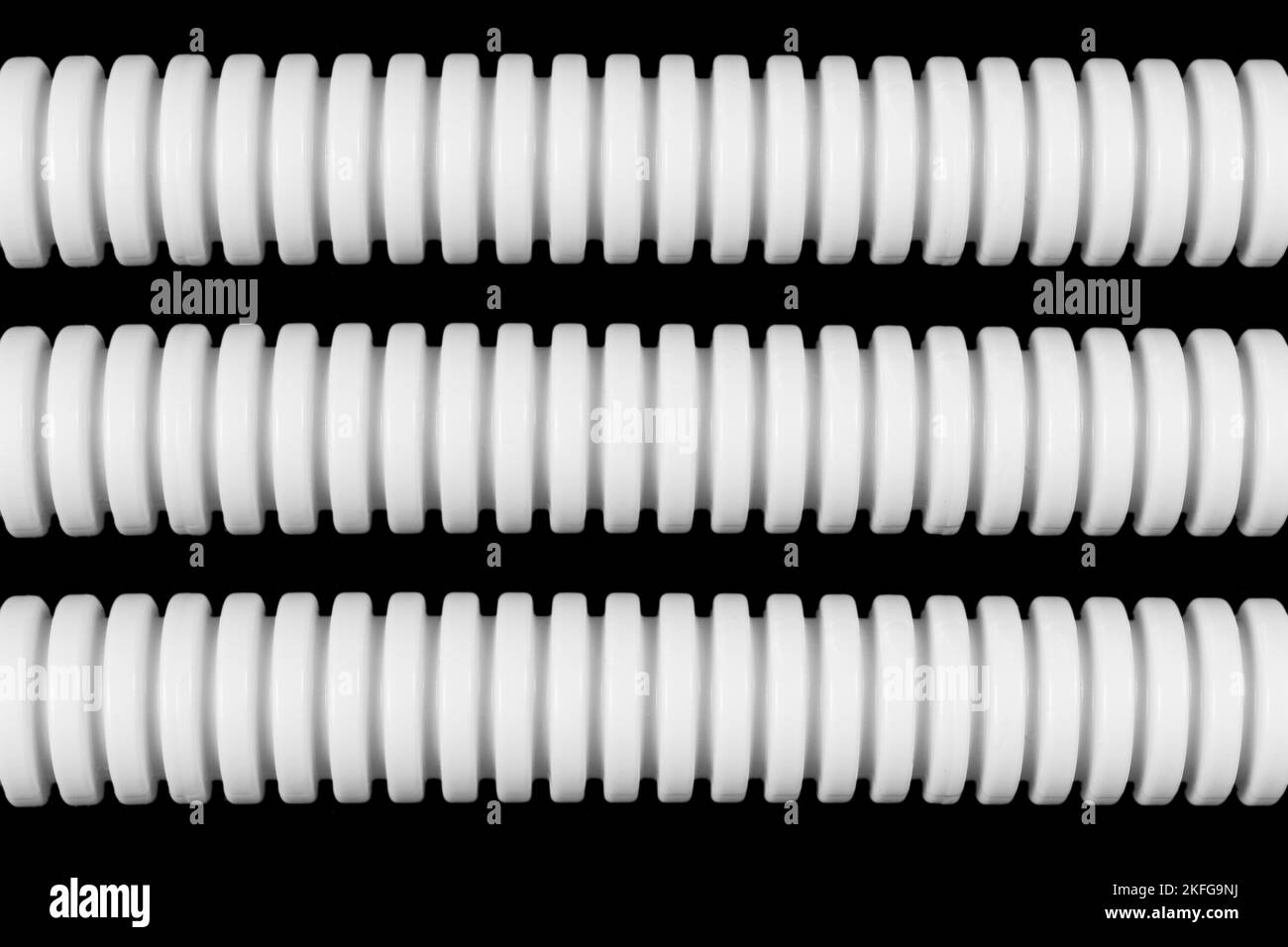 Plastic corrugated pipe tube for electrical installation close-up ...