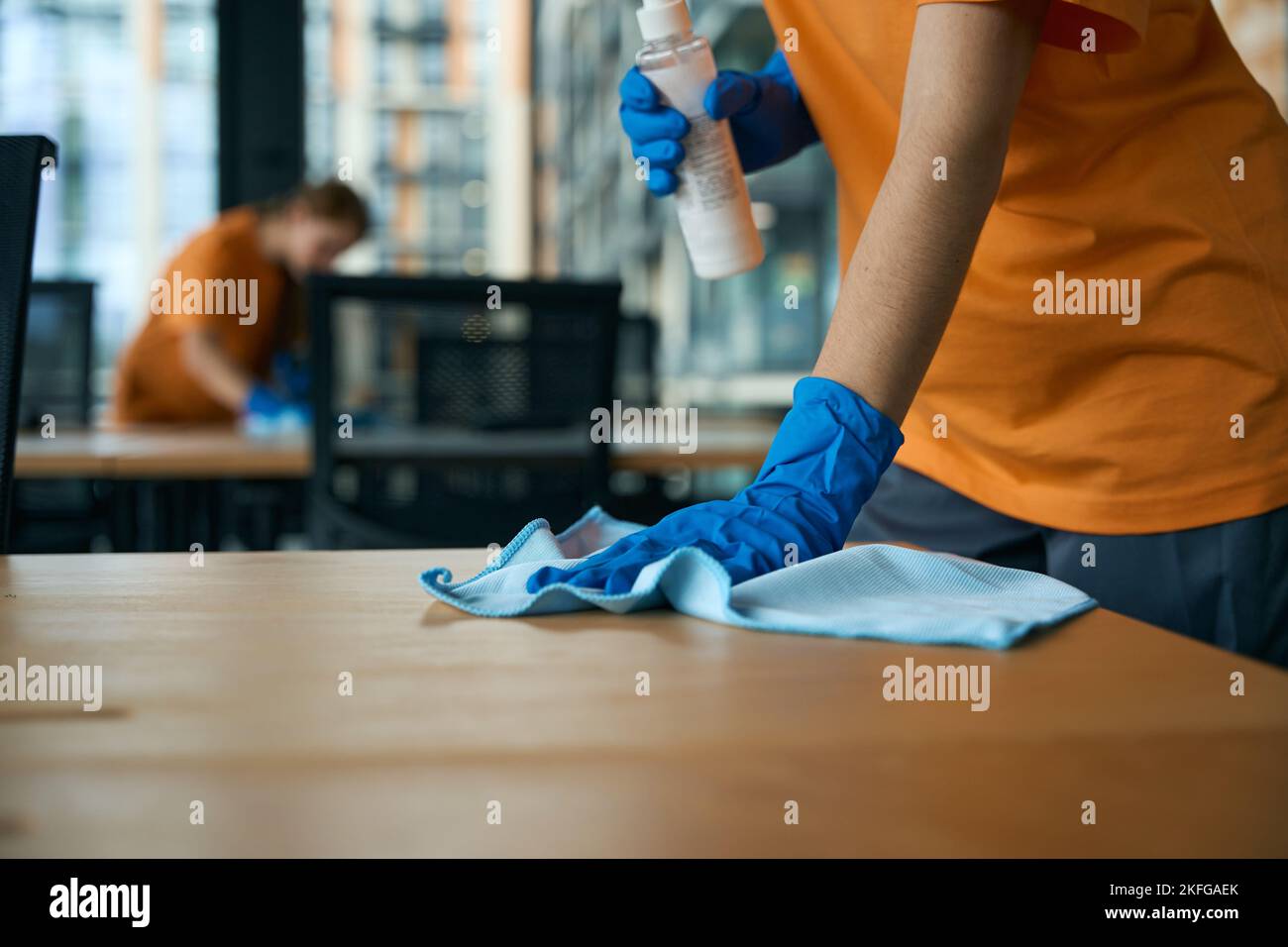 Person cleaning tables hi-res stock photography and images - Alamy