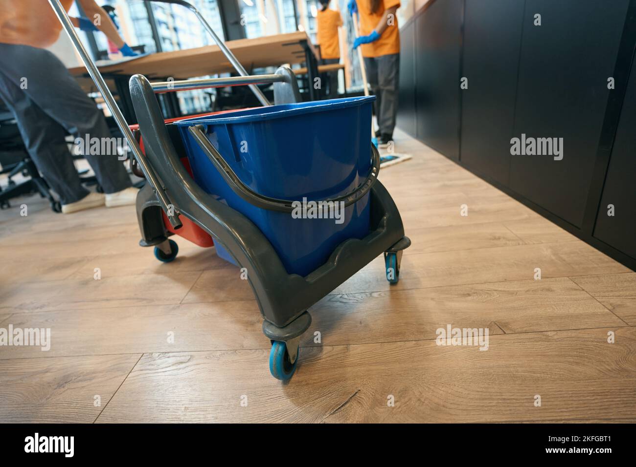 Work of cleaning company employees in the coworking area Stock Photo ...